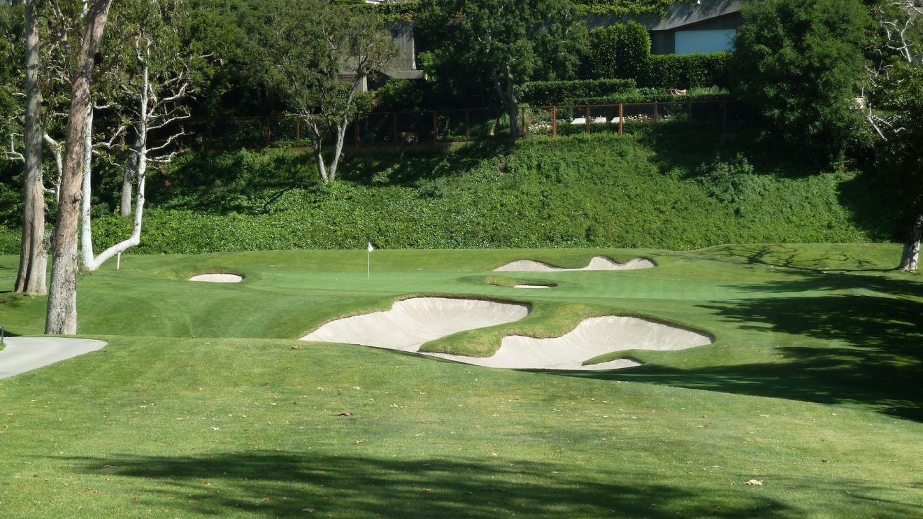Why is there a bunker in the middle of the green on the 6th hole at ...