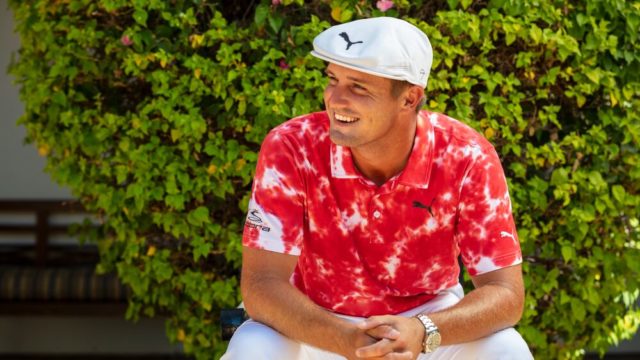 What kind of hat does Bryson DeChambeau wear when playing golf?