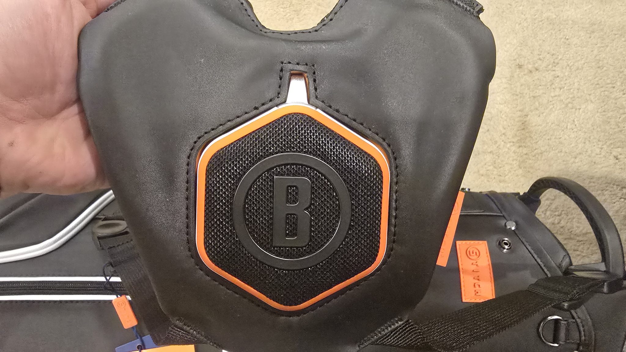 Check out this unique golf bag strap that has a Bluetooth speaker and ...